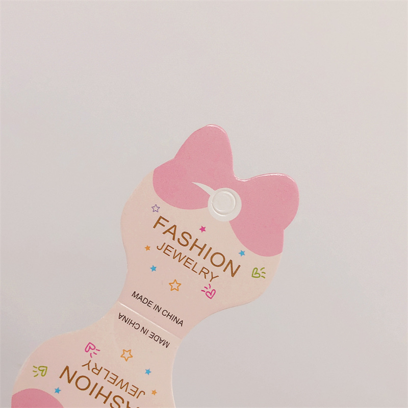 包装資材★タグ カード ヘアゴム台紙 100枚 | 卸売・ 問屋・仕入れの専門サイト【NETSEA】